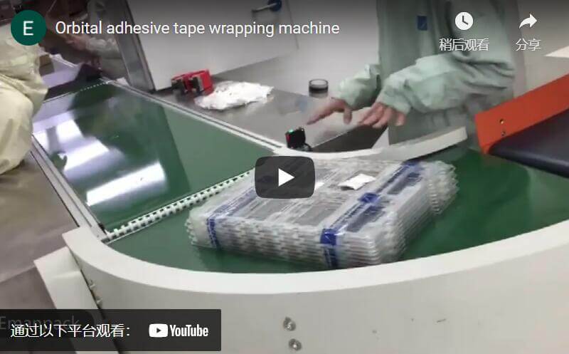 Orbital tape wrapping machine binding trays - emanvideo
