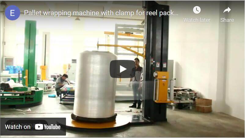 Pallet wrapping machine with clamp for reel packaging - emanvideo