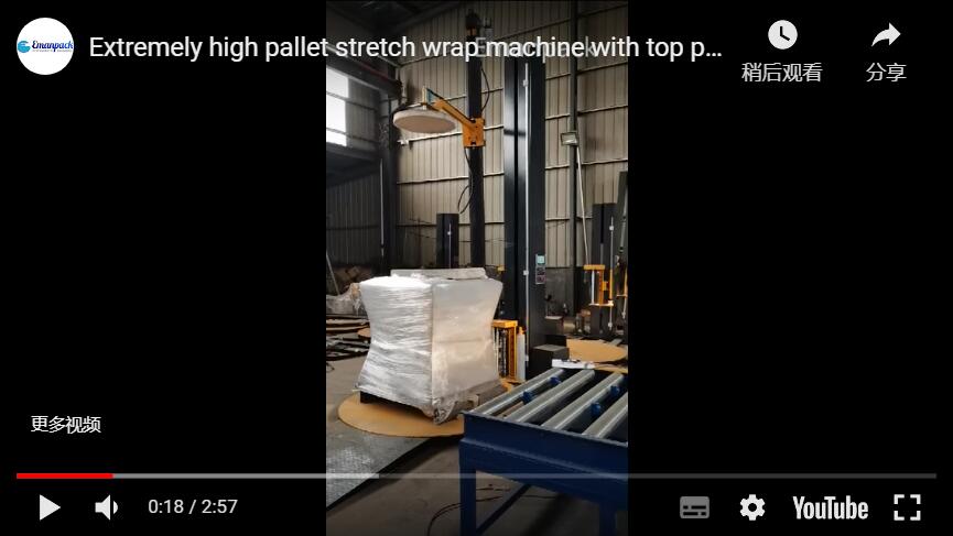 Extremely high pallet stretch wrap machine with top press platen and ...